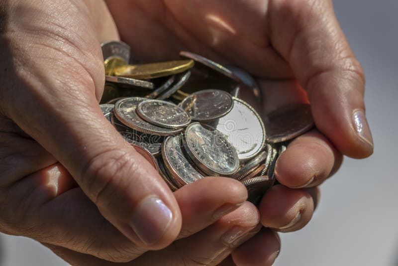 A Hand Holding and Dropping Coins Editorial Stock Image - Image of bank ...