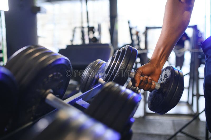 Hand Holding Dumbbell. Close Up Stock Image - Image of active, workout ...