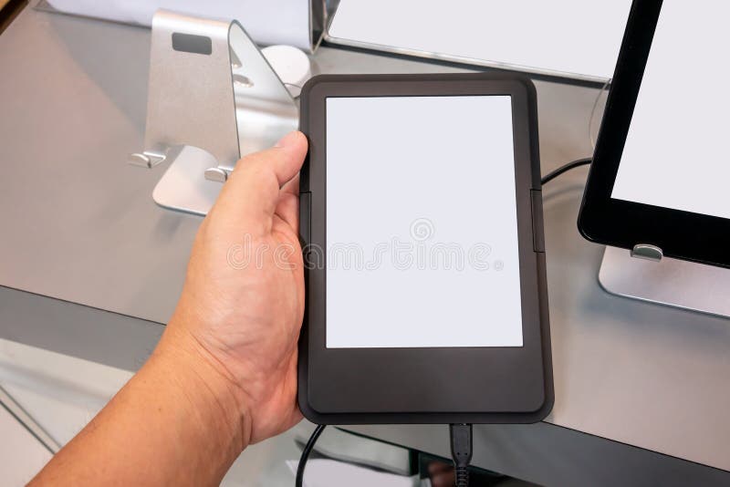 Hand Holding an E-book Reader Device in Black Stock Image - Image of ...