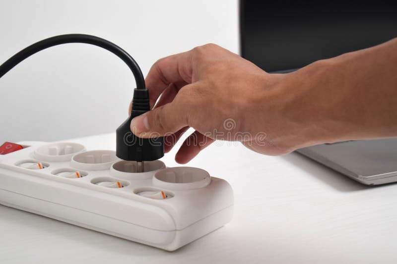 Hand Holding Electric Plug, Multiple Socket with Connected Plugs ...