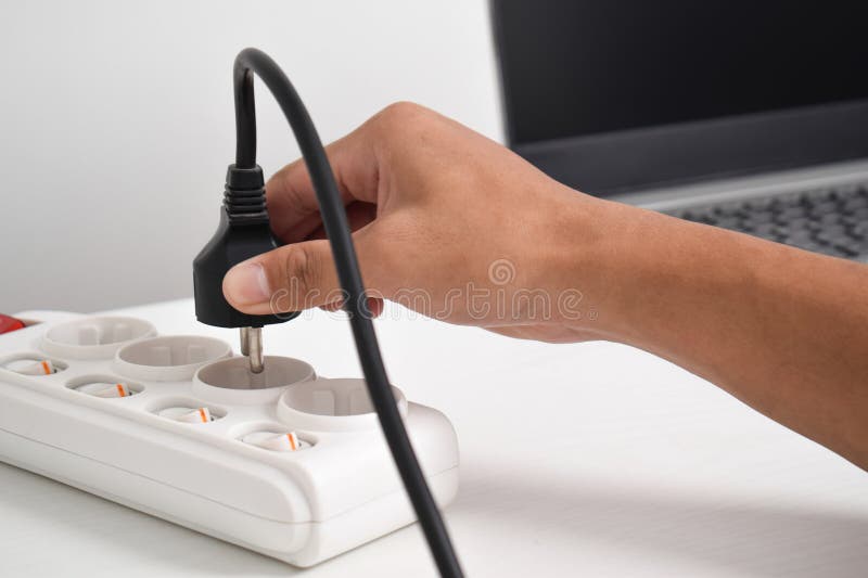 Hand Holding Electric Plug, Multiple Socket with Connected Plugs ...