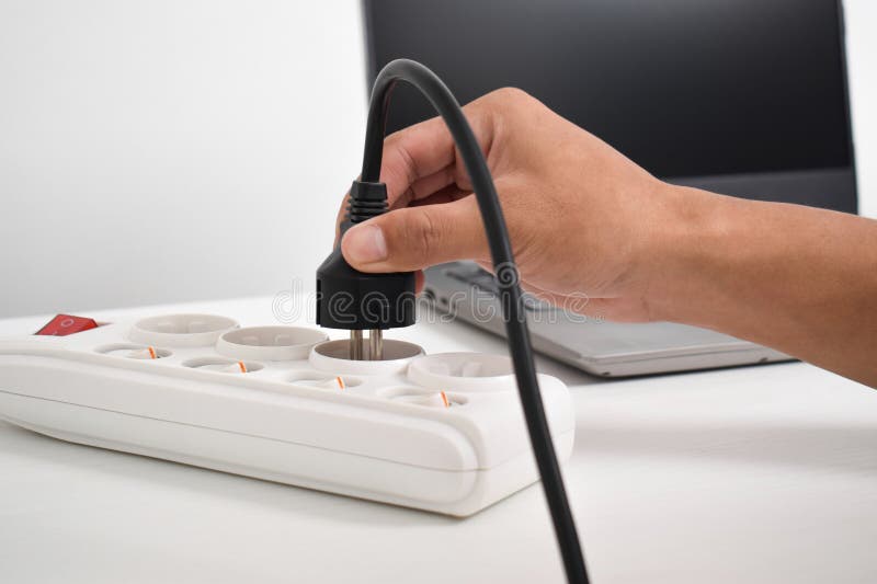 Hand Holding Electric Plug, Multiple Socket with Connected Plugs ...