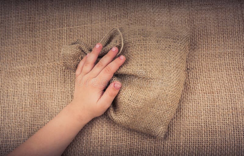 Hand Holding Empty Little Sack Made of Linen Stock Image - Image of ...