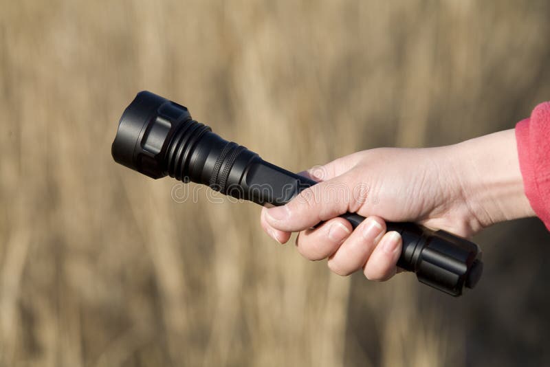 Flashlight in hand, stock photo. Image of hold, device - 7619728