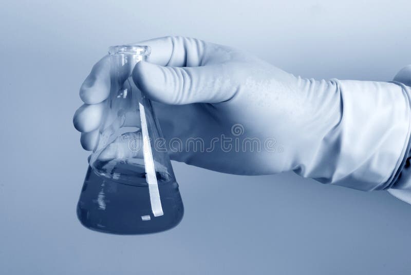 Hand holding flask stock image. Image of chemist, industry - 10651735