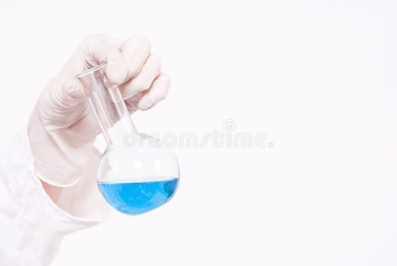 Hand holding flask stock photo. Image of flask, chemistry - 14442442