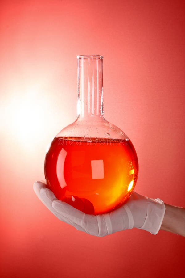 Hand Holding Flask stock image. Image of chemistry, measure - 266787