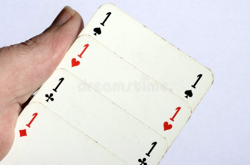 Hand holding four aces stock image. Image of poker, playing - 69482359