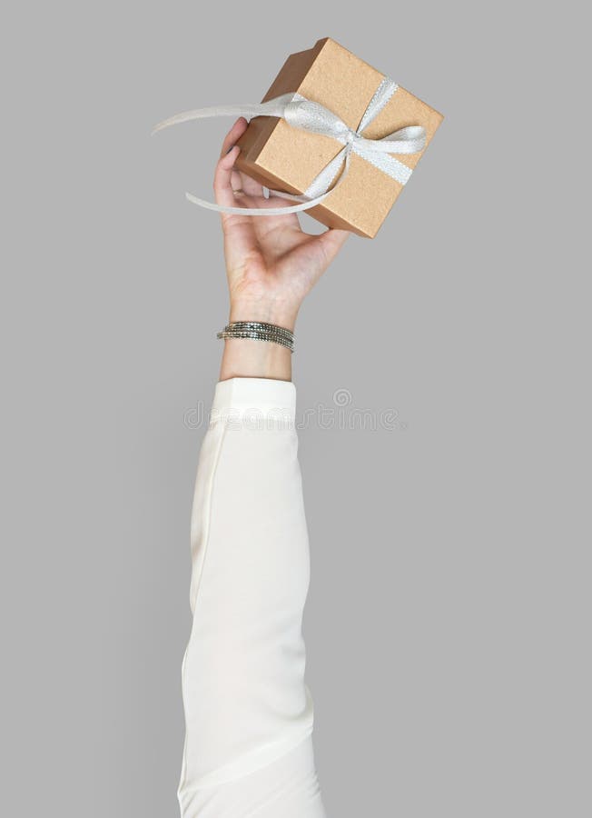 Hand holding a gift box stock image. Image of package - 108018889