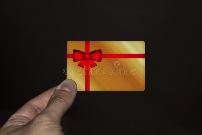 Hand holding a gift card stock image. Image of gift - 261721263