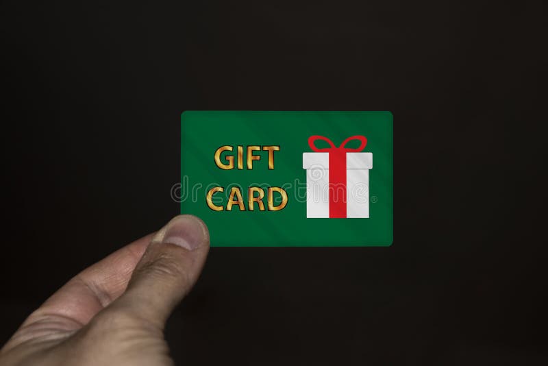 Hand holding a gift card stock photo. Image of card - 261721270