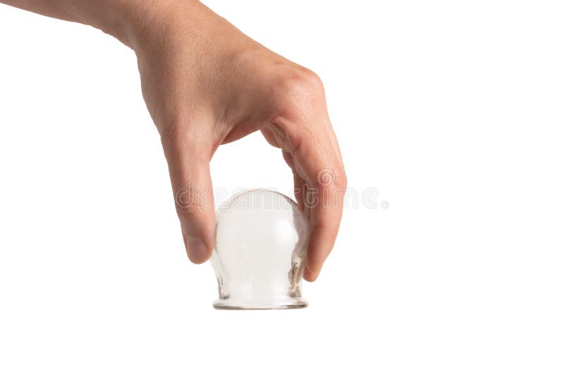A Hand Holding a Glass Cup for Cupping Therapy Stock Image - Image of ...