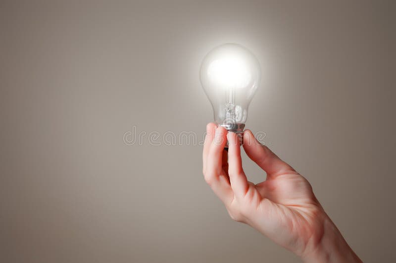 Hand with light bulb stock photo. Image of ecology, industry - 29992562