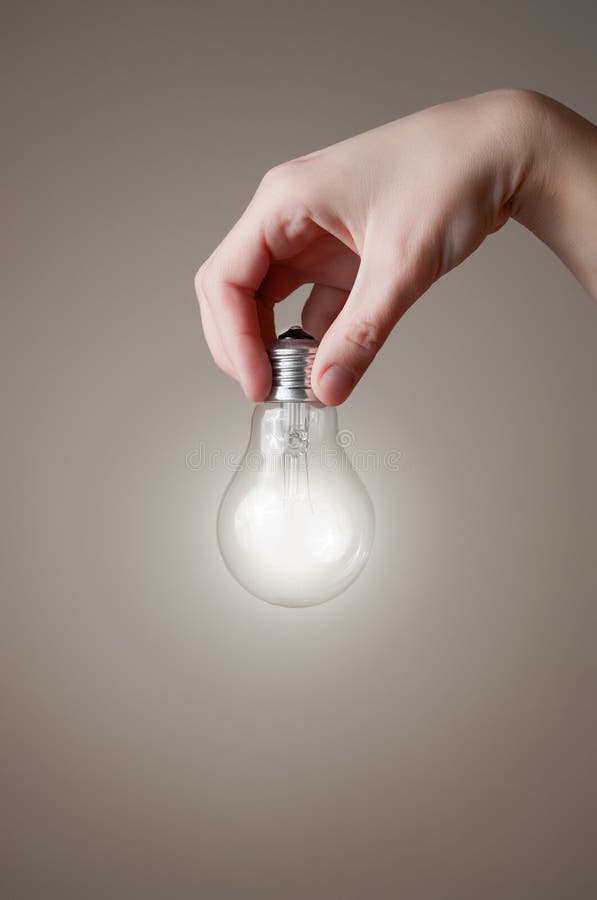 Hand with light bulb stock photo. Image of ecology, industry - 29992562