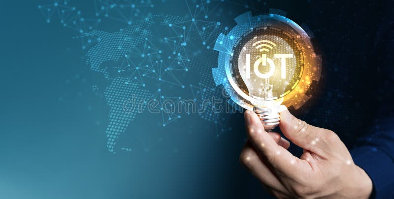 Hand Holding Glowing Light Bulb with IoT Text and Digital Network World Map Concept of Smart ...