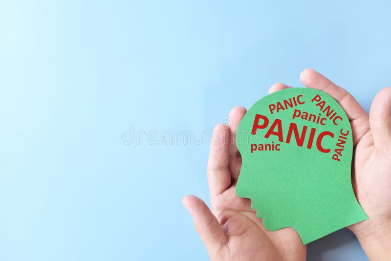 Hand Holding Green Human Head Profile with Multiple Panic Word As Brain ...