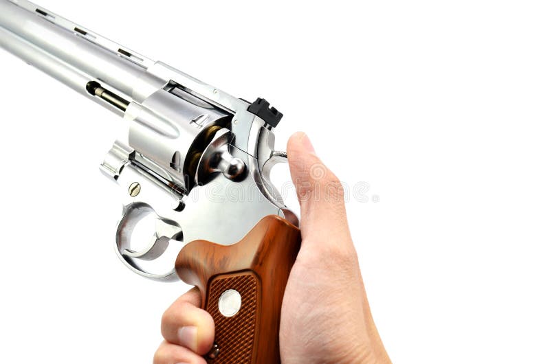Hand holding revolver stock photo. Image of dangerous - 32744178