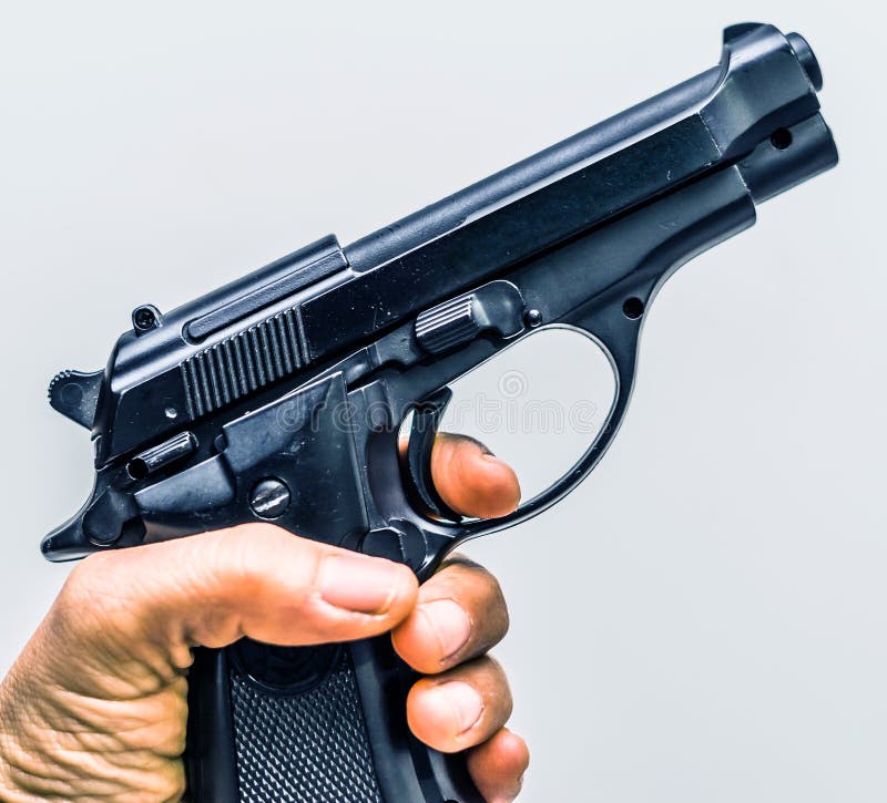Gun shooting stock photo. Image of defence, pistol, holding - 27380924