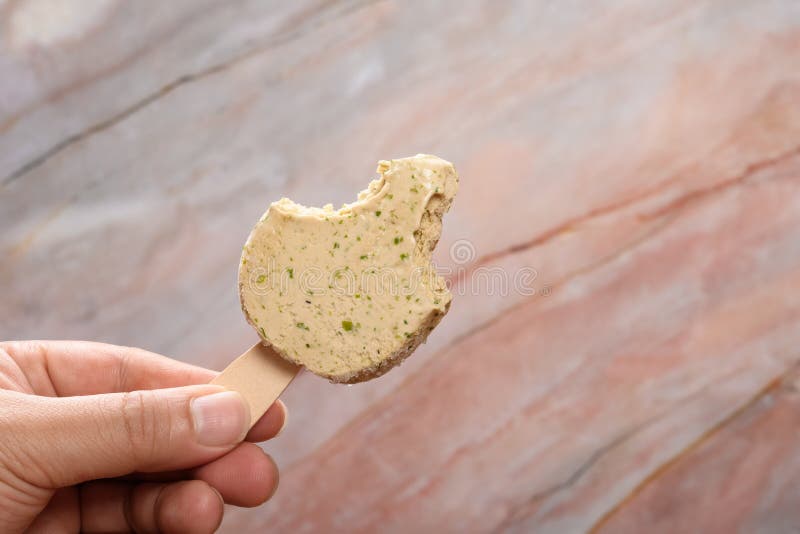 Hand Holding Half Eaten Seaweed Flavor Popsicle Stock Photo - Image of ...