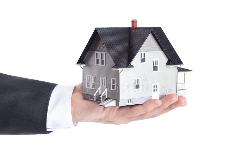 Hand Holding House Model with Red Bow Stock Photo - Image of hand ...