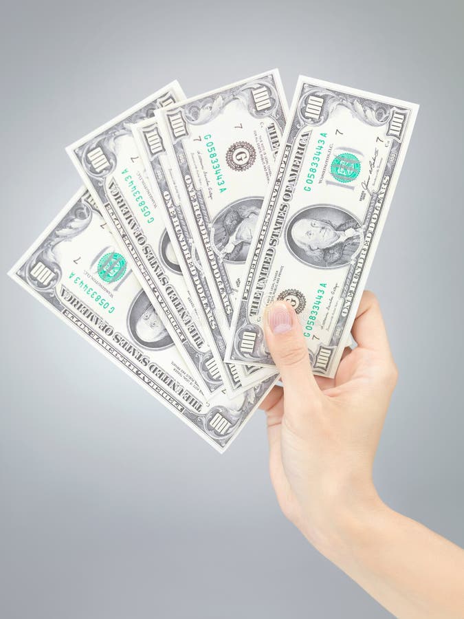 Man Holding a Hundred Dollar Bill Stock Photo - Image of banknote ...