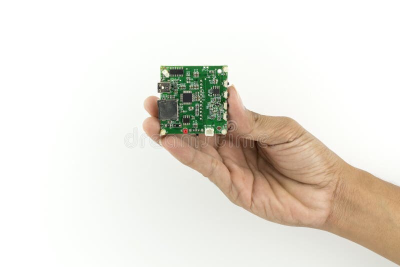 Hand holding IC chip. stock photo. Image of hand, device - 96016286