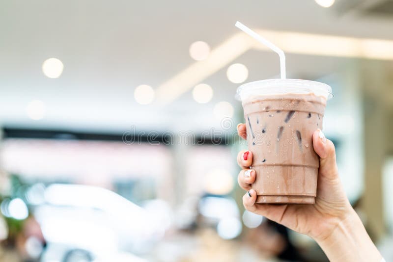 Hand Holding Iced Belgian Chocolate Milkshake Cup Stock Image - Image ...