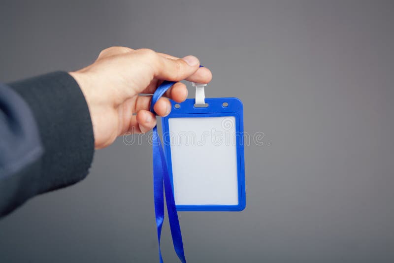 Hand holding id tag stock image. Image of marketing - 226353423