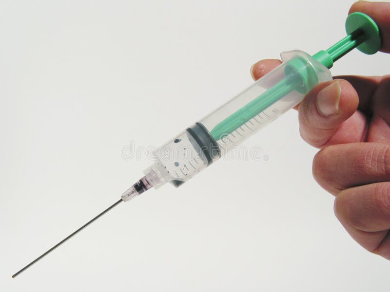 Hand holding an injection stock image. Image of printer - 145631