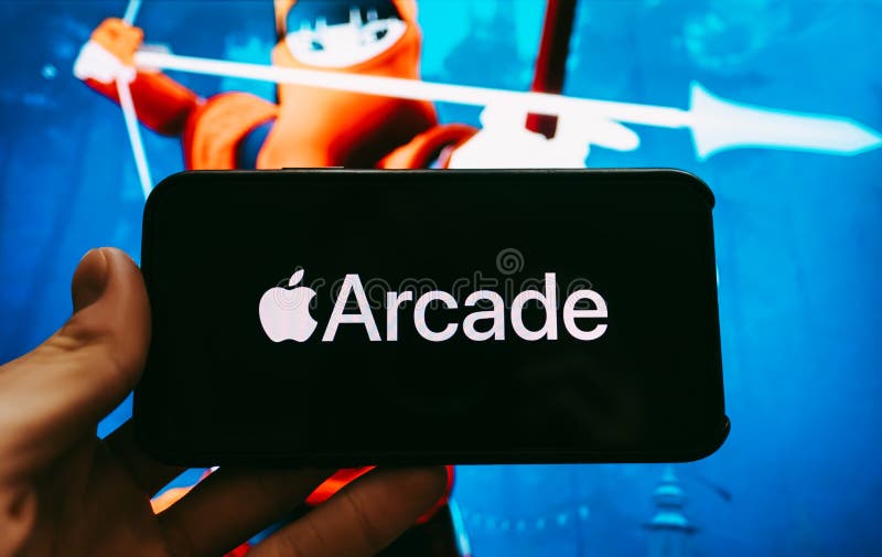 Hand Holding the IPhone with Apple Arcade Logo on the Screen Editorial ...
