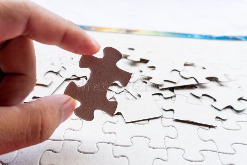 Hand Holding Jigsaw in His Hand for Put Missing One Stock Image - Image ...