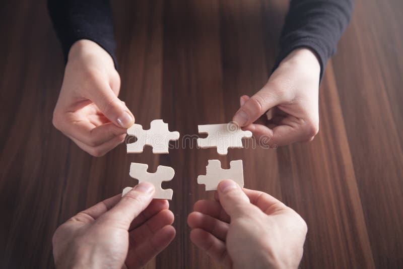 Hand Holding Jigsaw Puzzle Piece. Solution, Success, Teamwork Stock ...