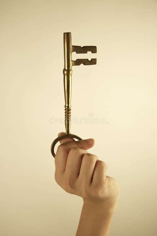 Hand holding key stock photo. Image of metal, woman, brass - 4411664
