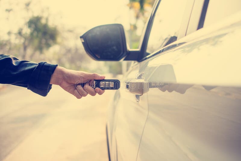 Hand Holding Key Car To Open Car Stock Photo - Image of luxury ...