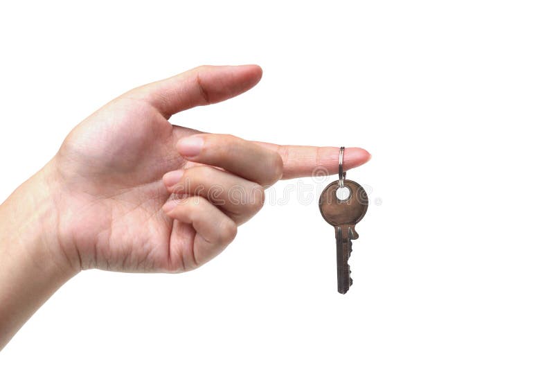 Hand holding a key stock photo. Image of business, isolated - 79076398