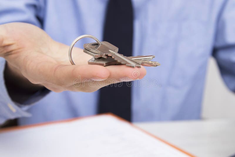 Hand holding keys stock photo. Image of hand, confidence - 134326862