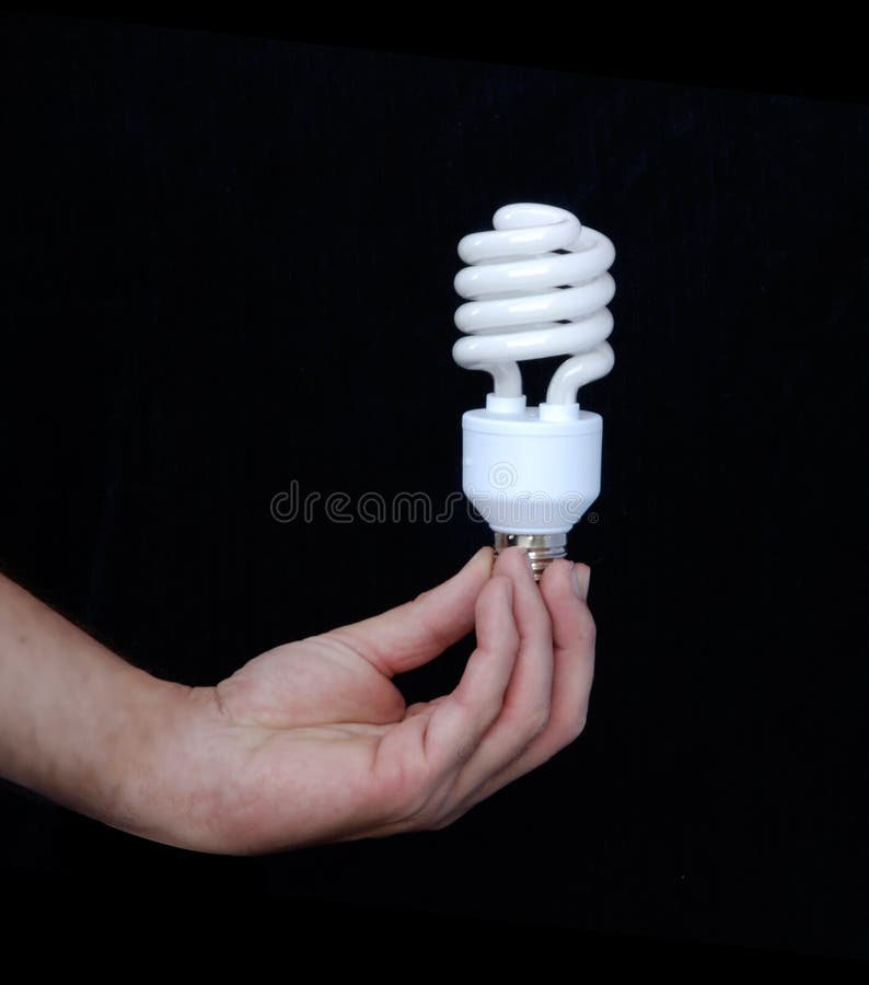 Hand holding a lamp stock photo. Image of conservation - 8153994