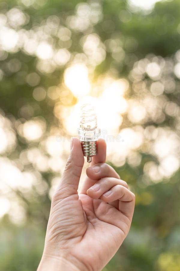 Hand Holding the Lamp and Have the Light. Image Use for Sparked New ...