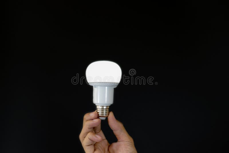 Hand Holding LED Light Bulb Stock Photo - Image of lightbulb, electric ...