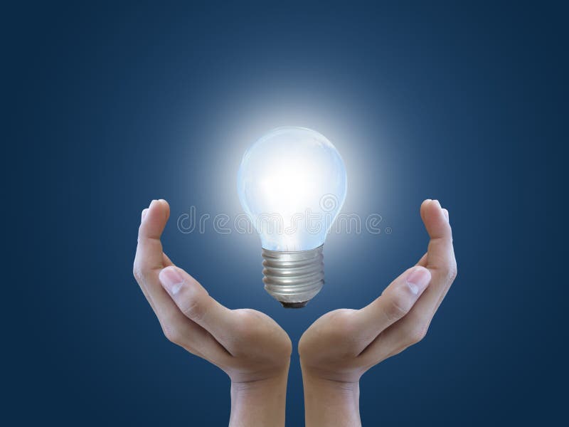 Hand with light bulb stock photo. Image of ecology, industry - 29992562