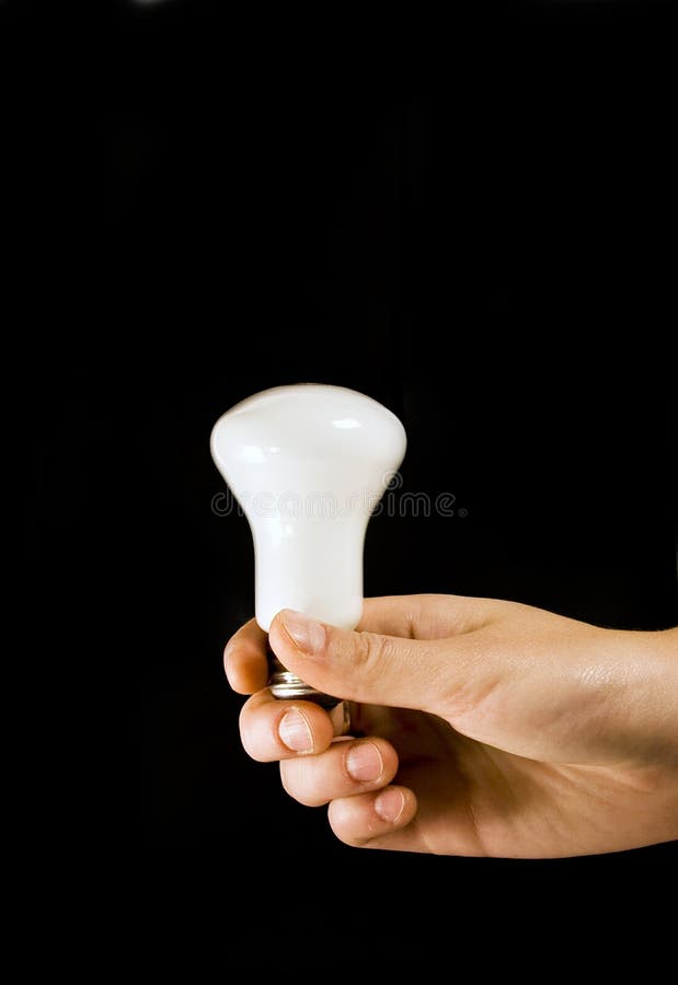 Hand holding light bulb stock image. Image of equipment - 6271799