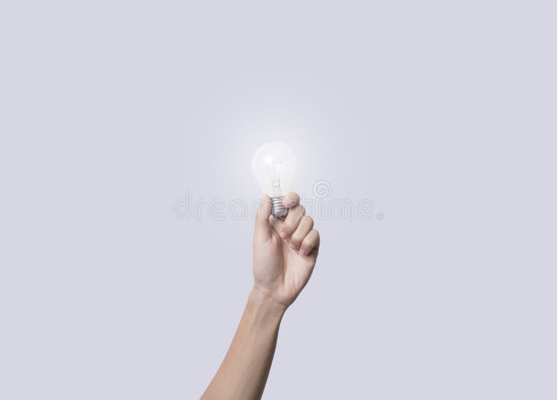 Hand Holding Light Bulb, Concept of New Technology Ideas Stock Photo ...