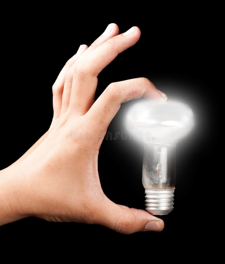 Hand Holding a Light Bulb, Isolated Dark Stock Image - Image of right ...