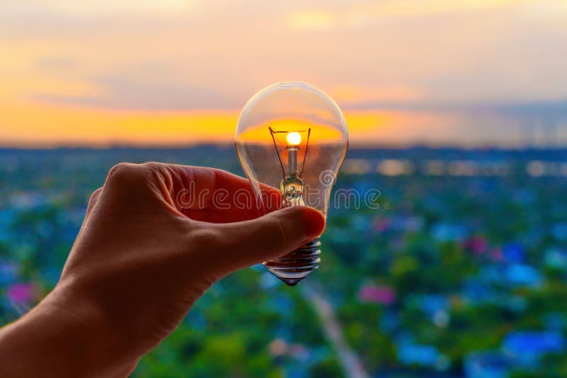 Emerging Technology: Sunrise through a Light Bulb Stock Image - Image ...