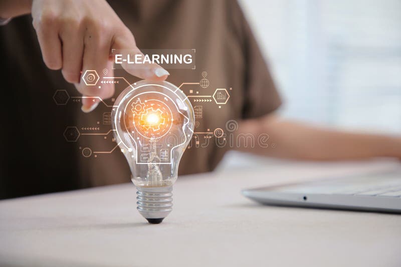 Hand Holding Light Bulb with Virtual Graduate Icon. E-learning ...