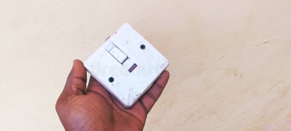 Hand Holding Light Switch for Controlling on and Off Lightning System ...