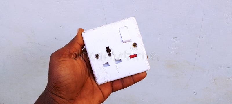 Hand Holding Light Switch for Controlling on and Off Lightning System ...