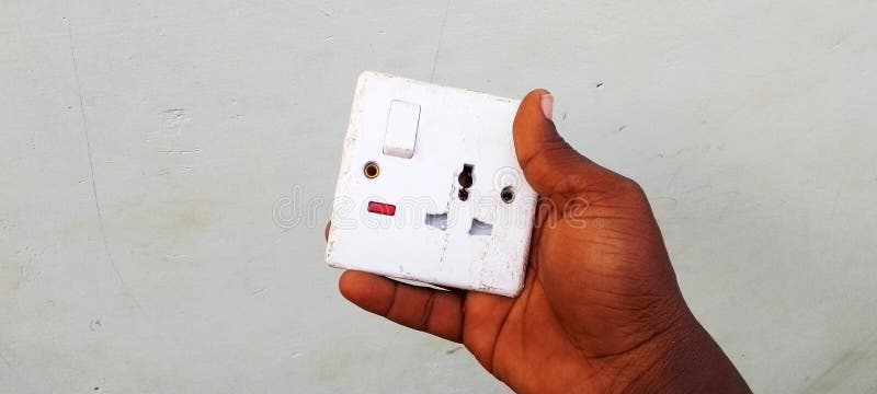 Hand Holding Light Switch for Controlling on and Off Lightning System ...