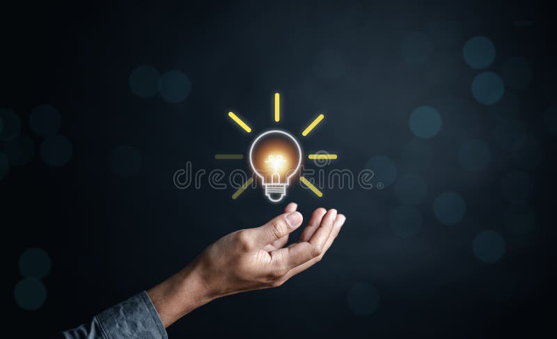 Hand Holding Lightbulb Icon for Objective Target To Successful ...