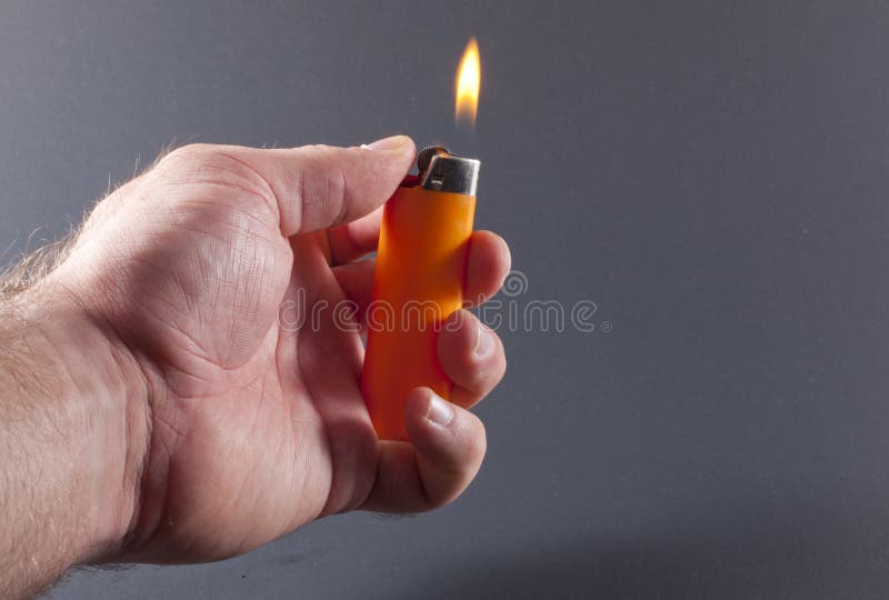 Hand holding a Lighter stock image. Image of light, flammable - 31013019